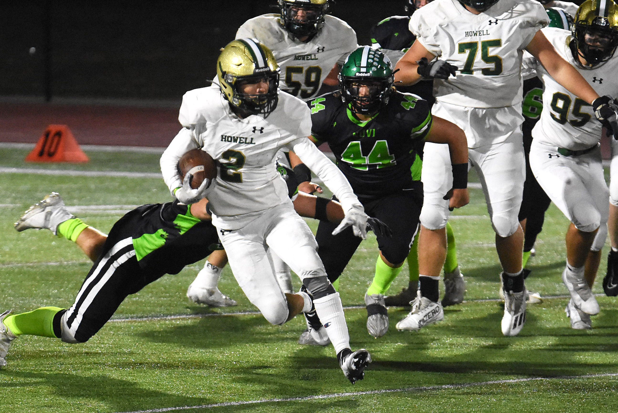 Spark at quarterback not enough for Howell in football loss to Novi