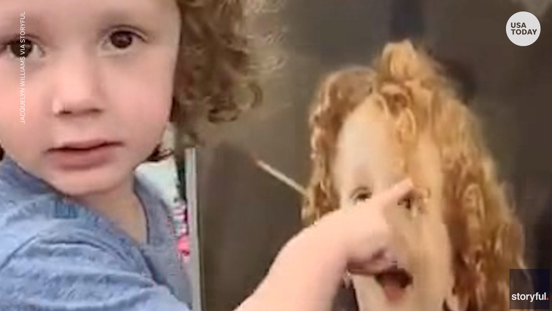 Confused toddler mistakes lookalike kid on Walmart poster for himself