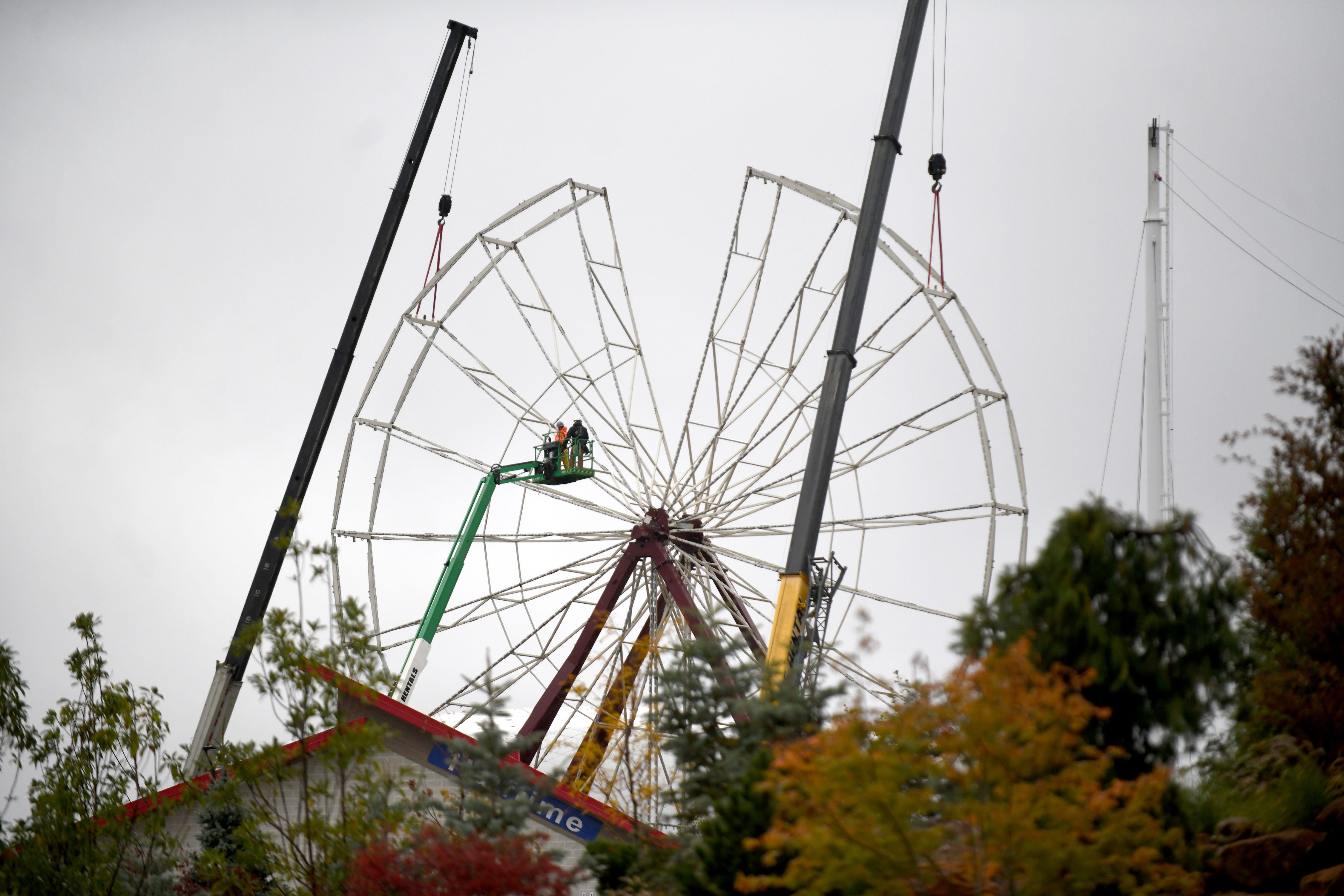 The 'Red Zone' giant Ferris wheel is under construction at HOF Village