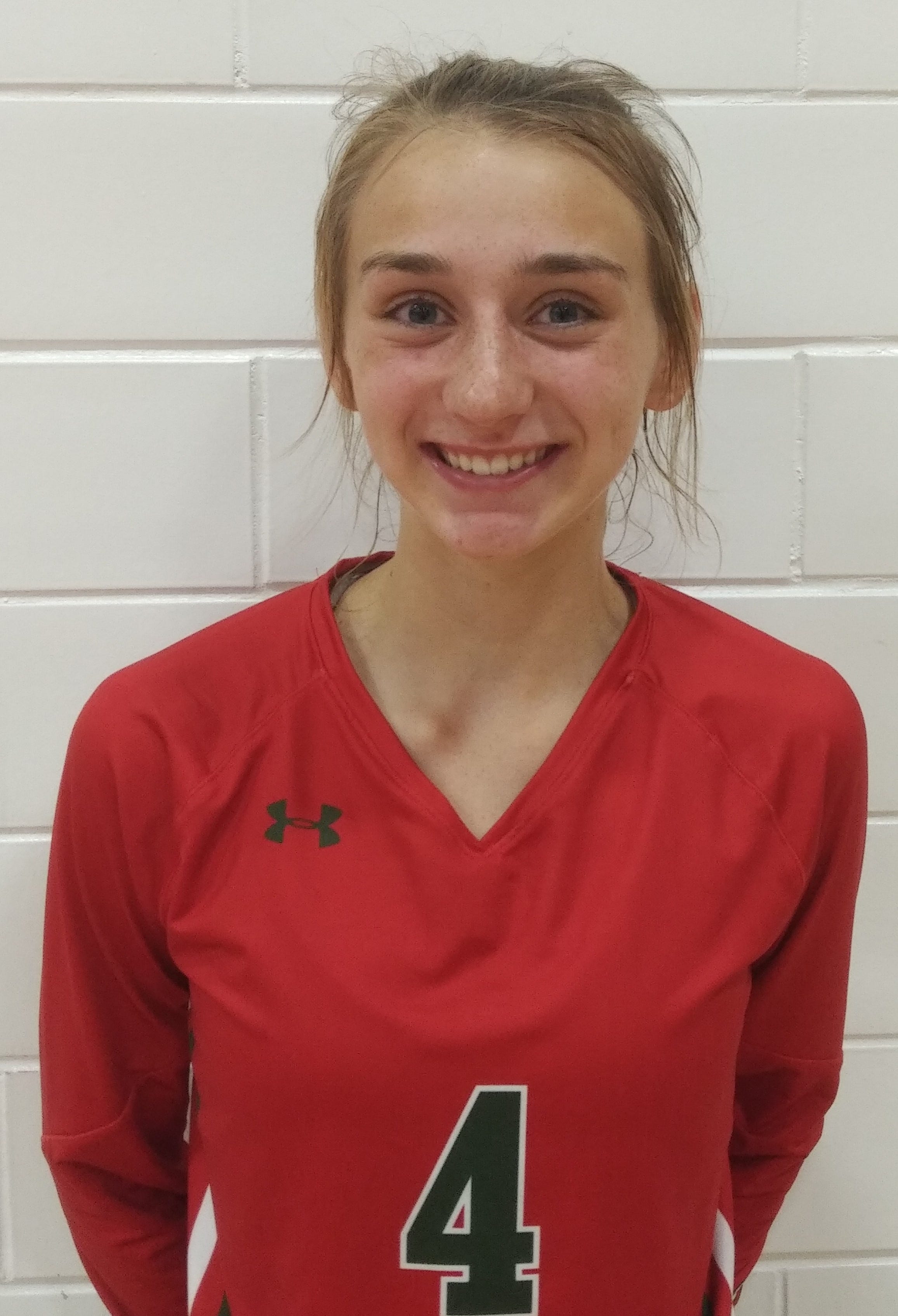 Lincoln's Becca Heitzig in postseason for volleyball, cross country