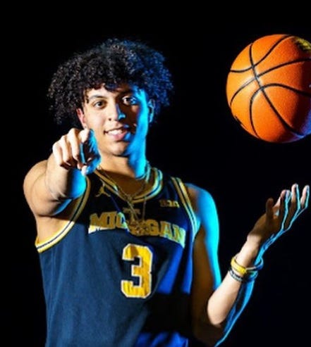 Top-100 guard George Washington III commits to Michigan basketball