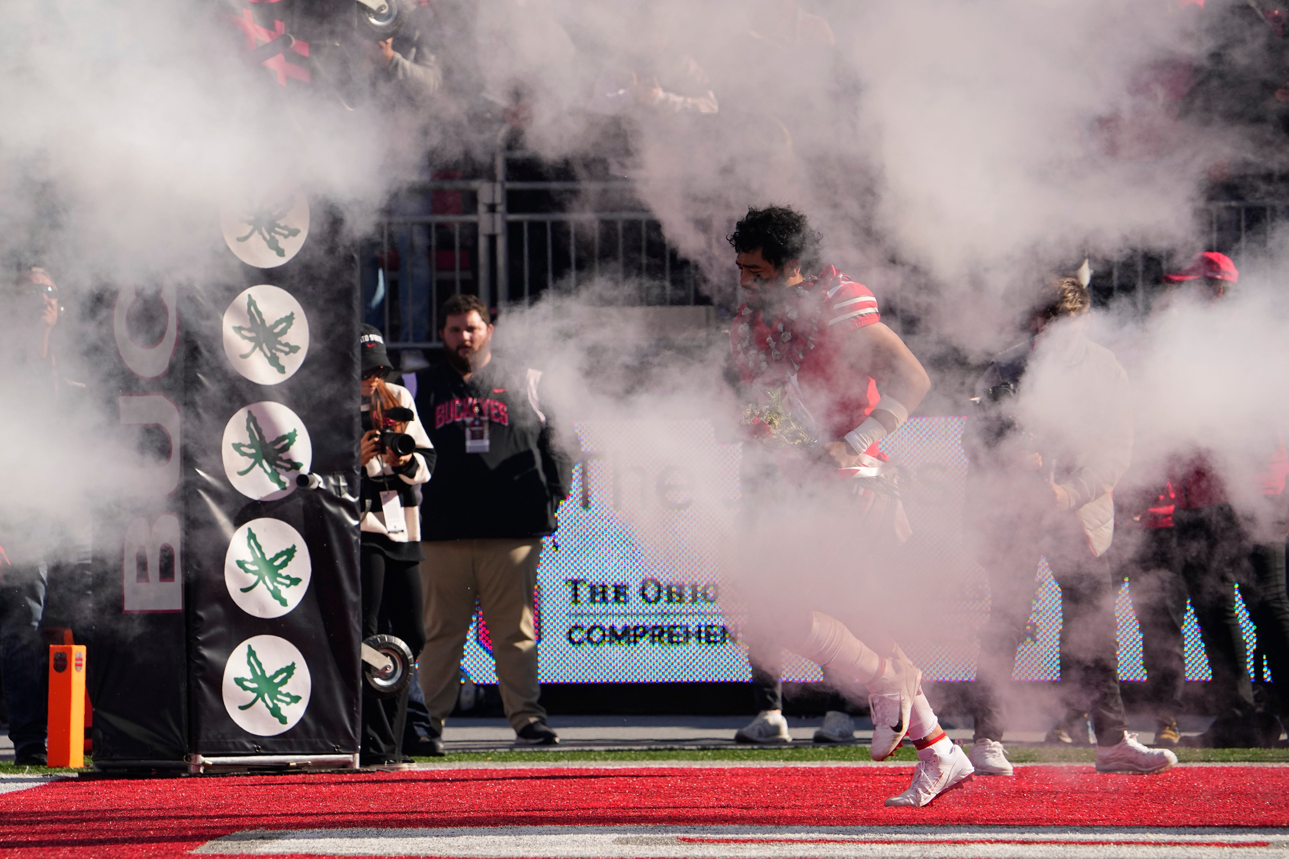 Michigan dominates second half to doom OSU title hopes 45-23.