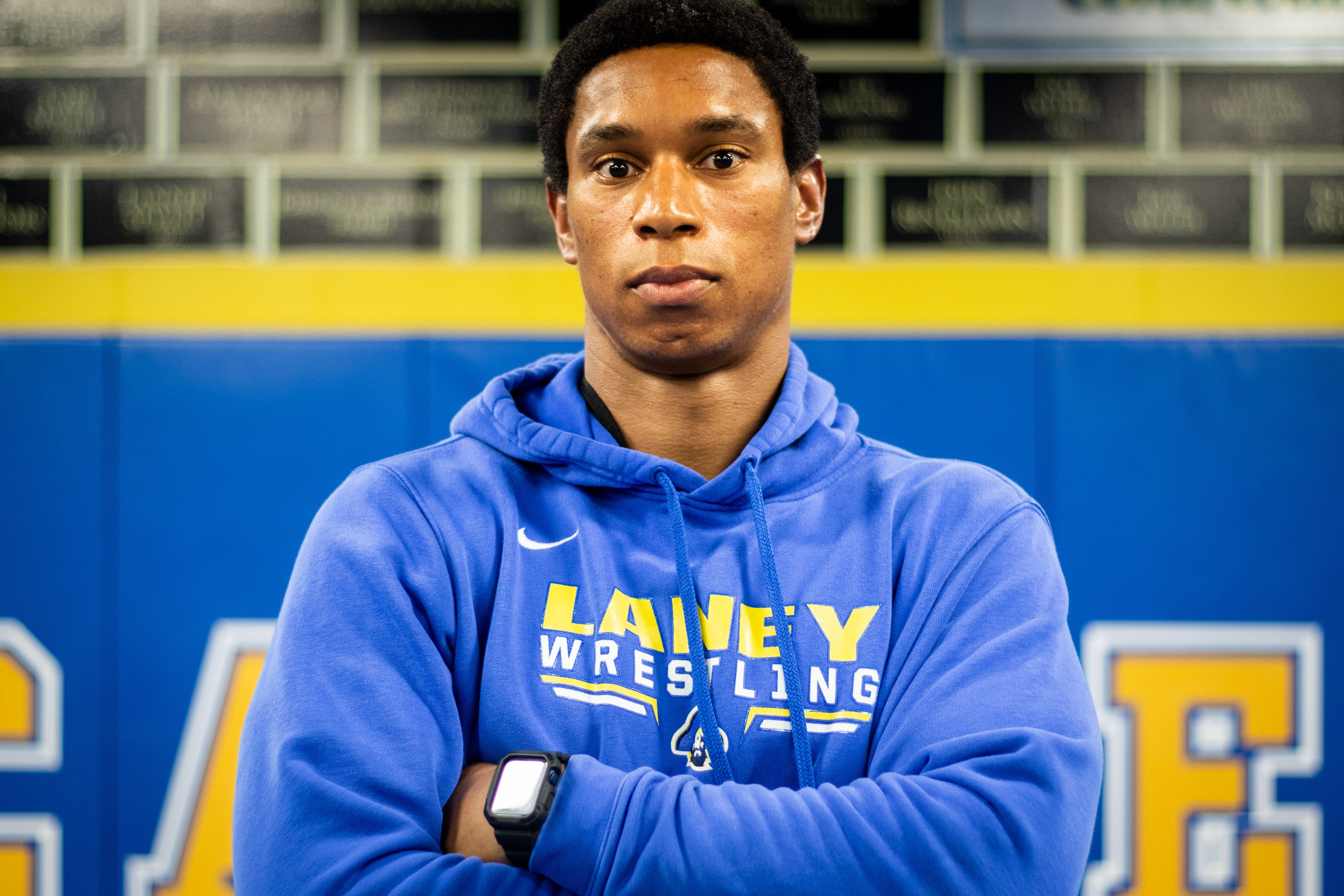 Laney wrestling coach Andre Adams reflects sacrifice he seeks from team