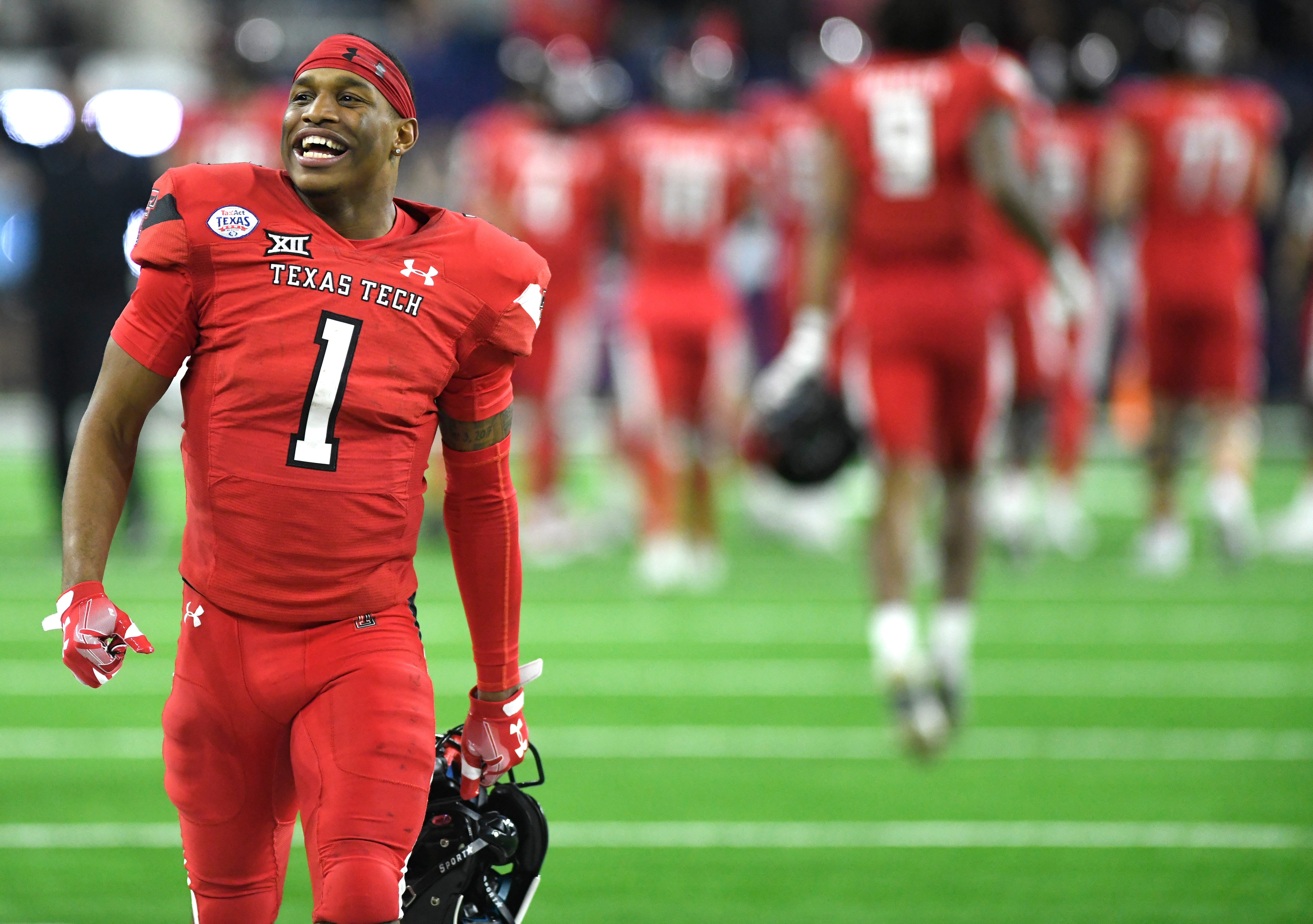 Struttin' home from Houston: Underdog Tech wallops Ole Miss in Texas Bowl