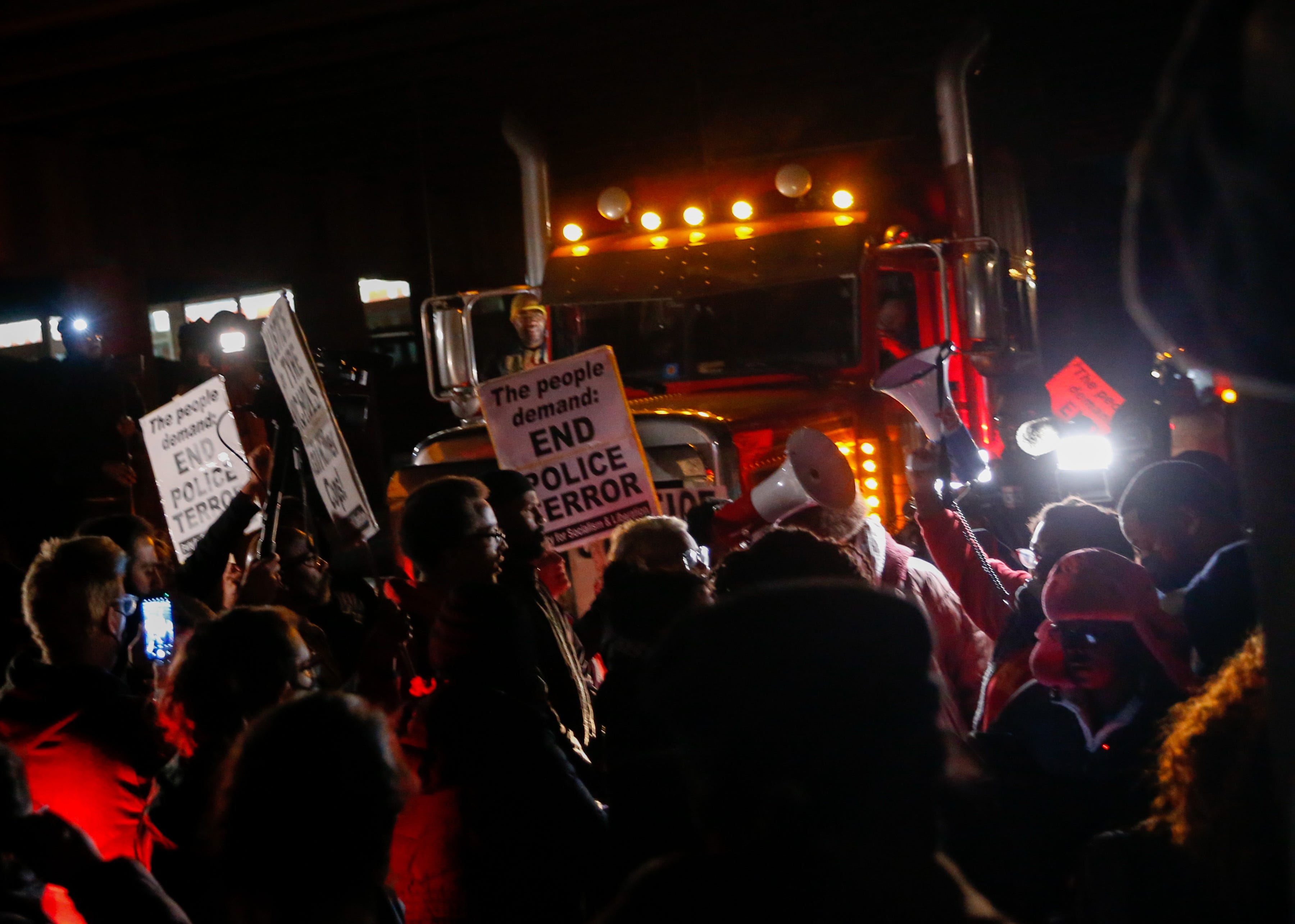 Demonstrators for Tyre Nichols hold traffic off on both sides of bridge in Memphis