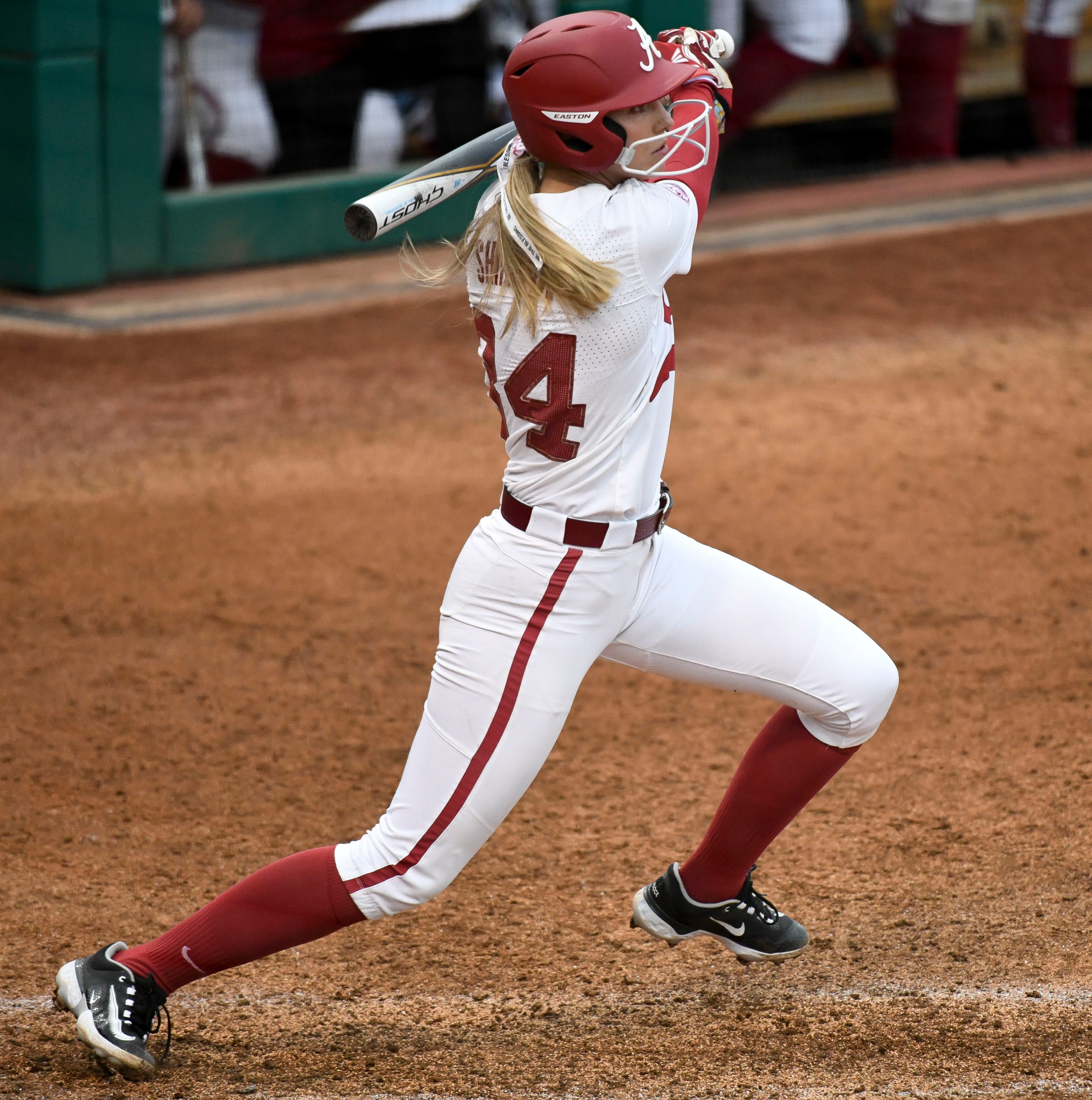 Four time All-American Jackie Traina throws out the first pitch ahead ...