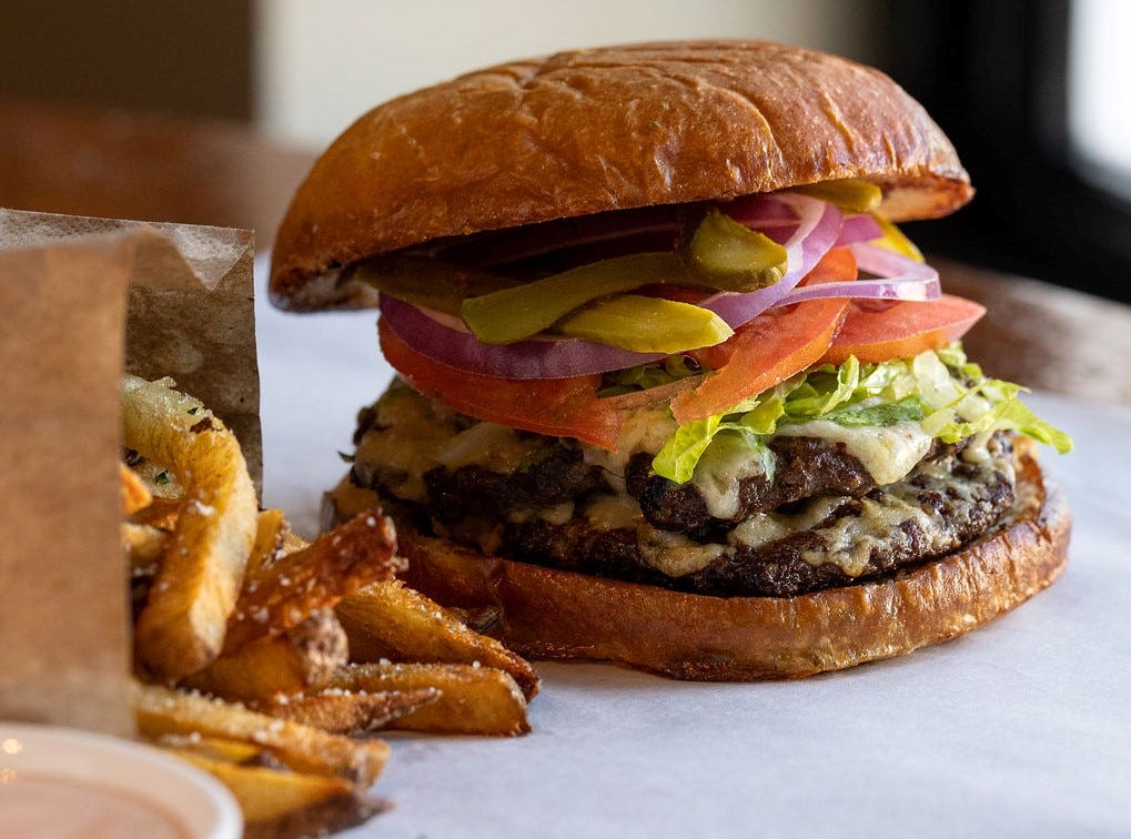 Grato in West Palm Beach welcomes, Buccan Sandwich Shop next door