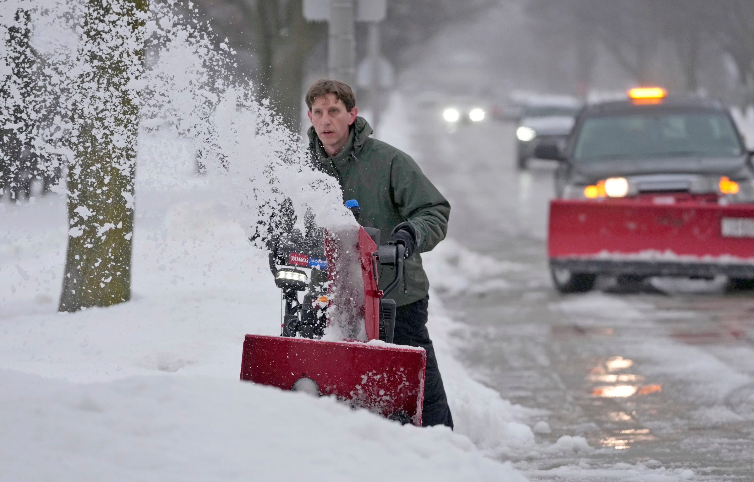 What are the snowfall, sleet totals in Wisconsin over last 24 hours?