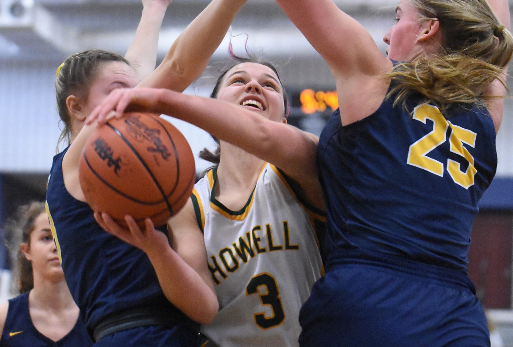 Howell pays back Hartland, wins girls basketball district championship