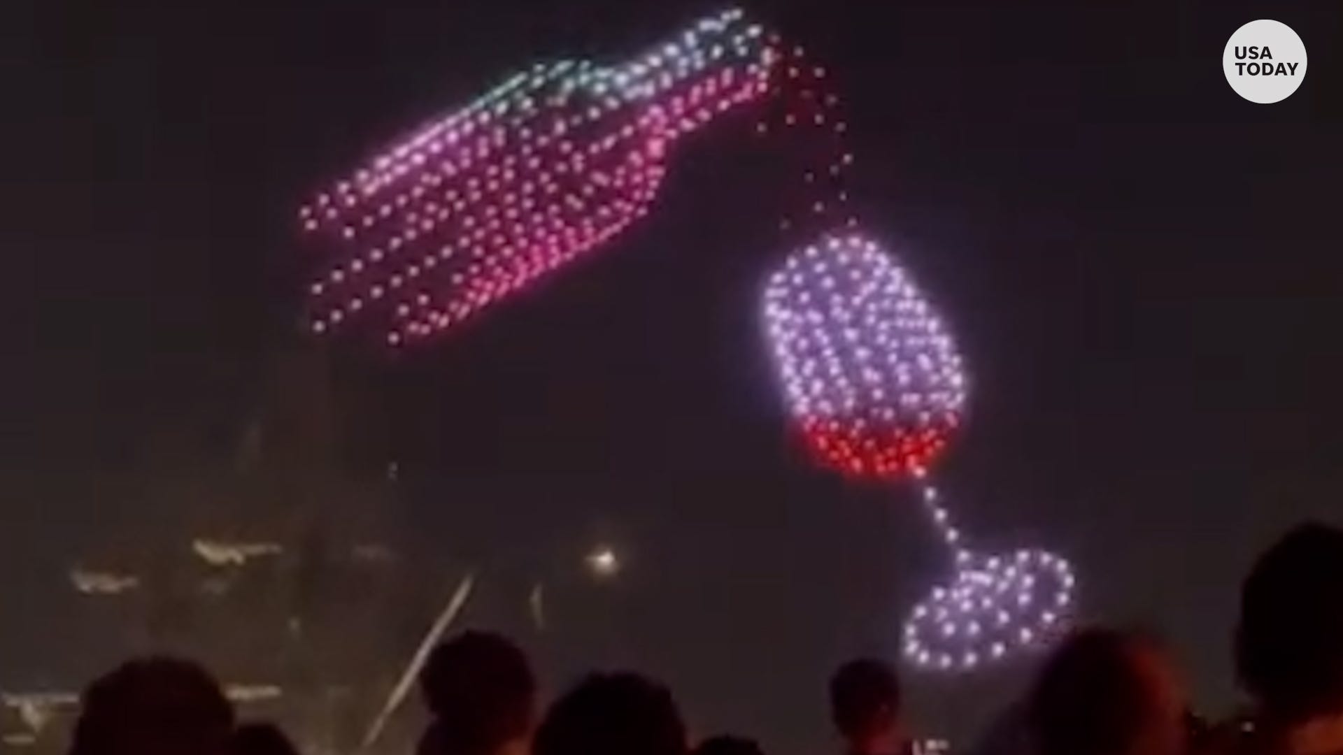 Mesmerizing drone show raises a glass in the night sky to close out ...